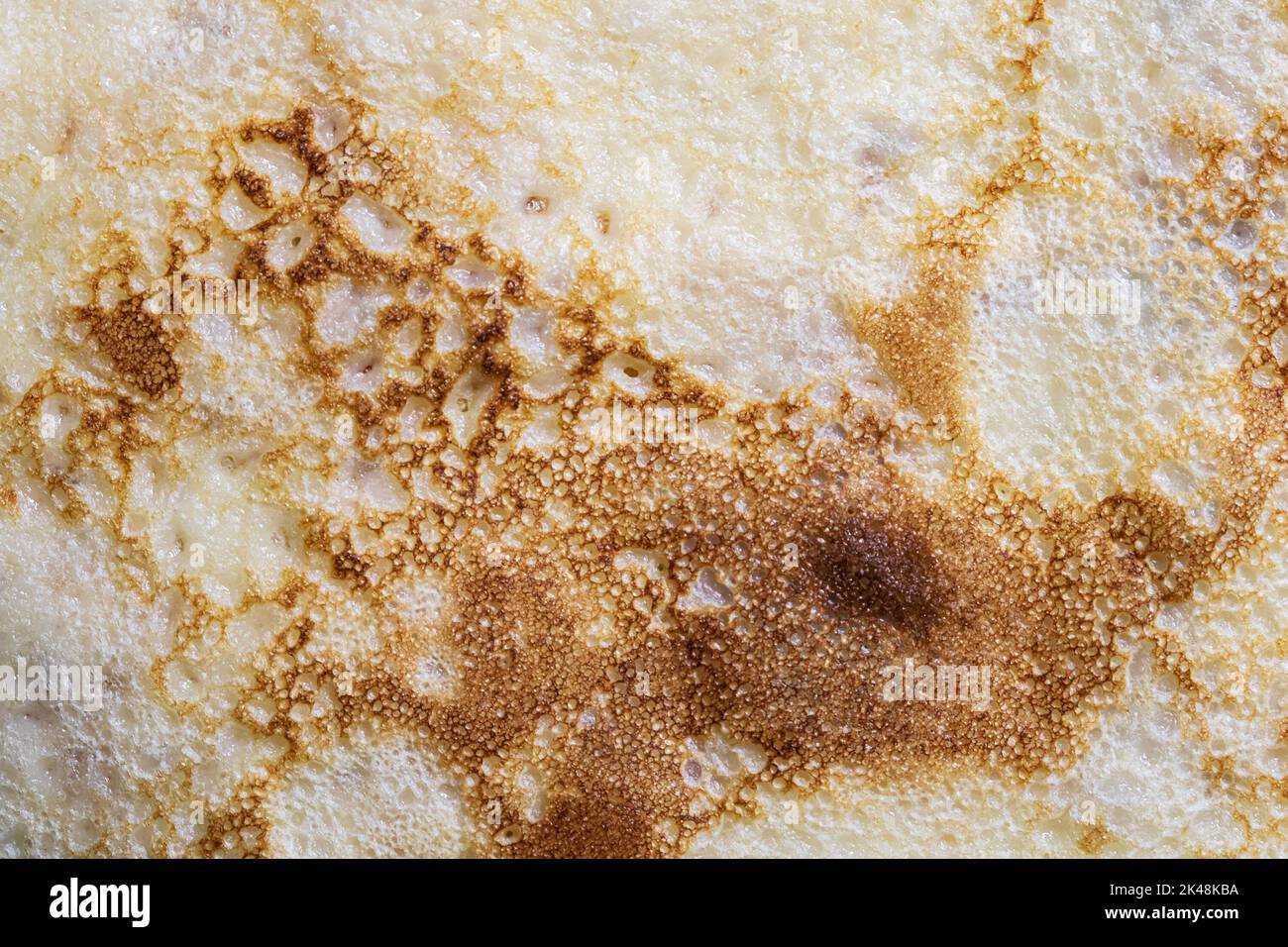 Pancake surface texture and pattern. Close-up of thin hot pancakes in a ...