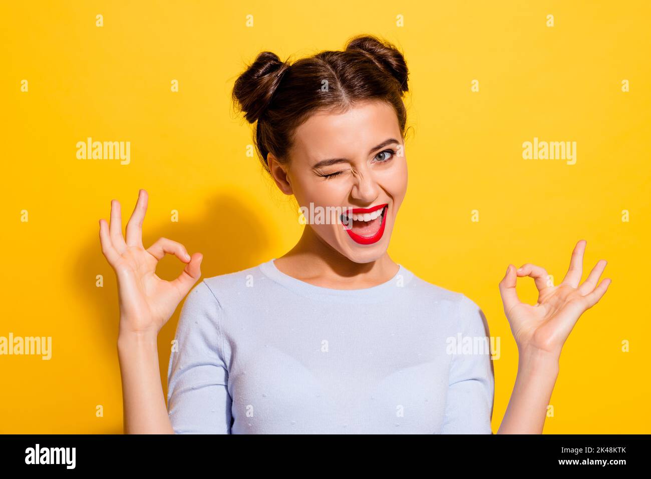 Photo of pretty attractive female flirty winking her eye showing okay ...