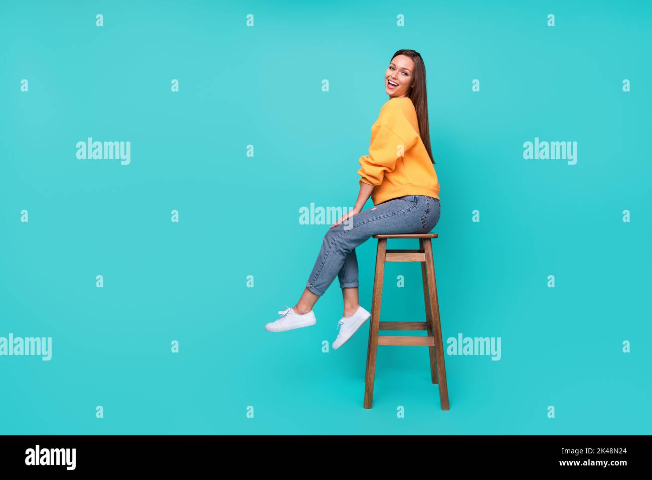 Side profile full length photo of young attractive nice girl sitting ...