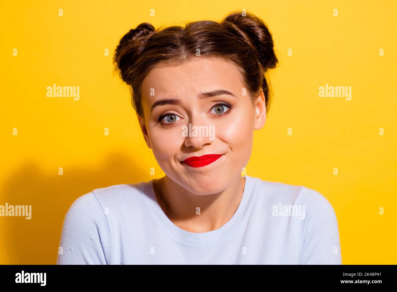 Photo of funny young female don't know what to do feel hesitant ...