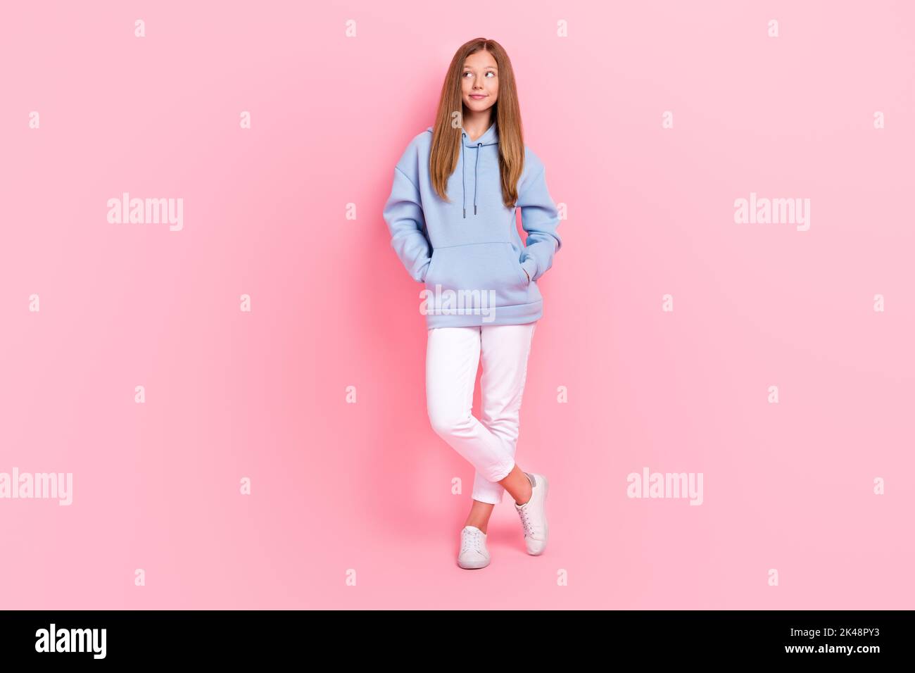 Full body portrait of positive minded person put hands pockets look ...