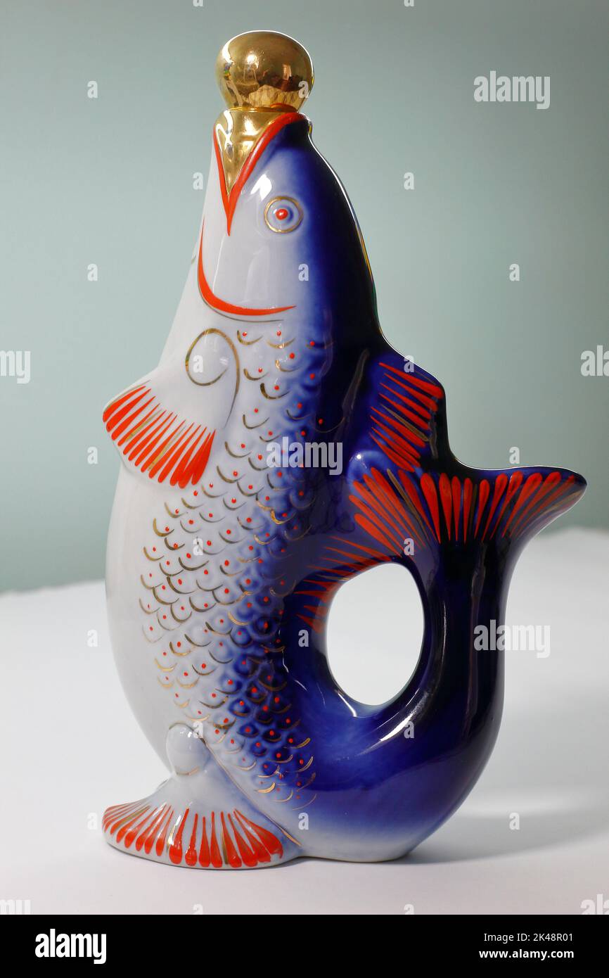 Porcelain decanter in the shape of a fish Stock Photo - Alamy