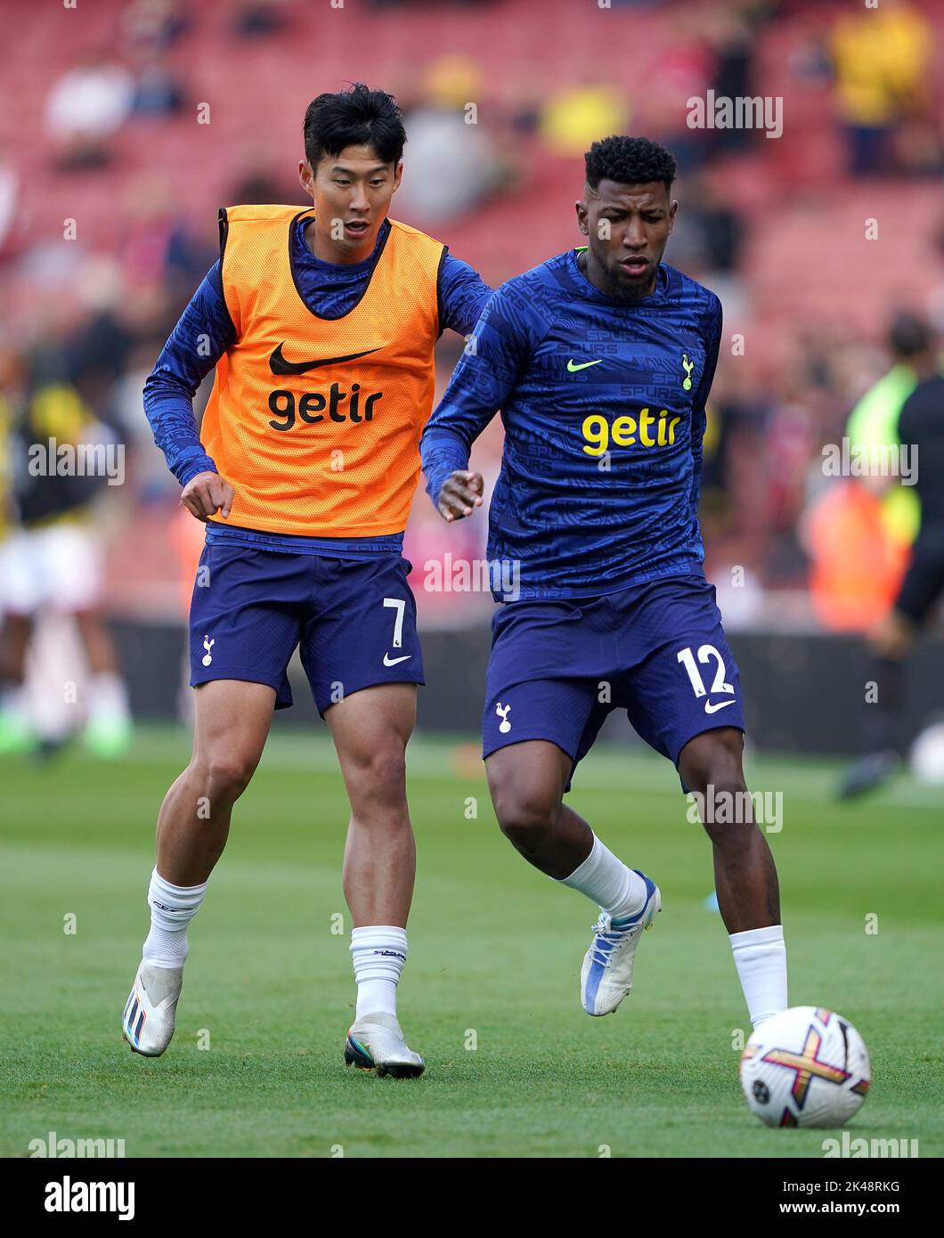 Tottenham Hotspur's Emerson Royal (right) and Son Heung-min warm up on ...