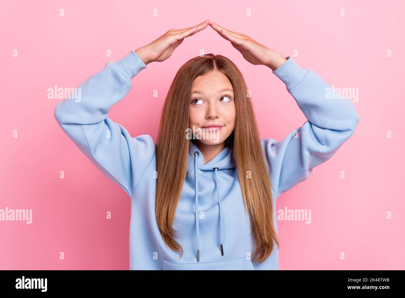 Photo of young little pretty cute beautiful lady positive dreamy hold ...