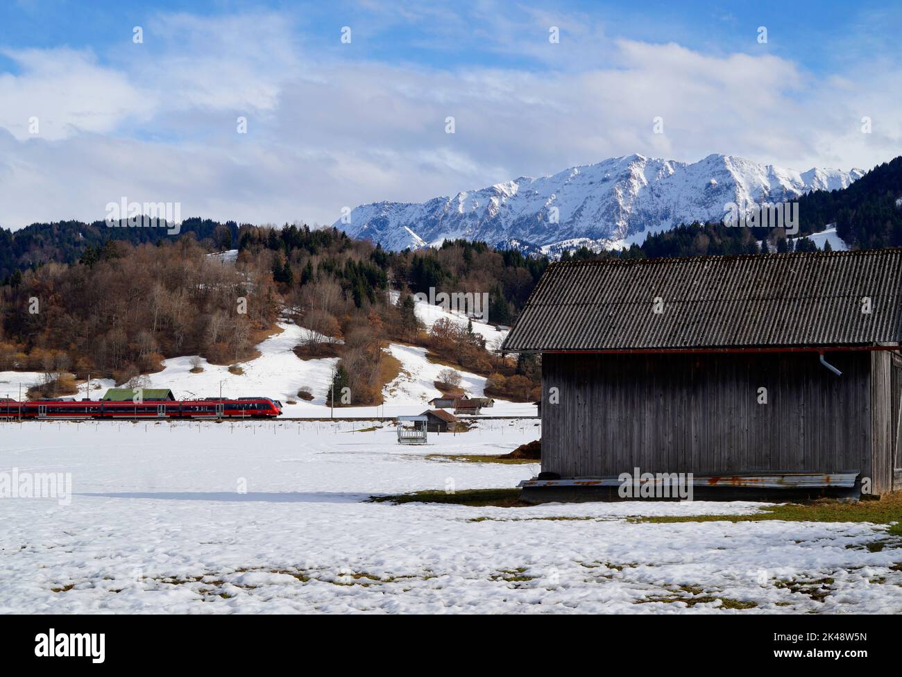Red train in the bavarian alps hi-res stock photography and images - Alamy
