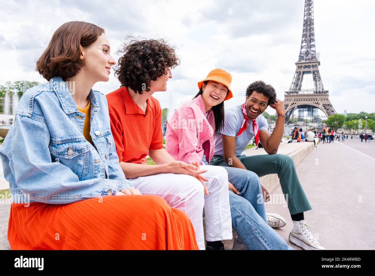 Group of young happy friends visiting Paris and Eiffel Tower, Trocadero ...
