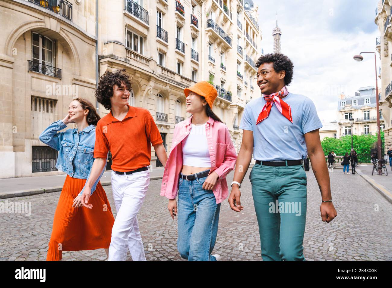 Group of young happy friends visiting Paris and Eiffel Tower, Trocadero ...