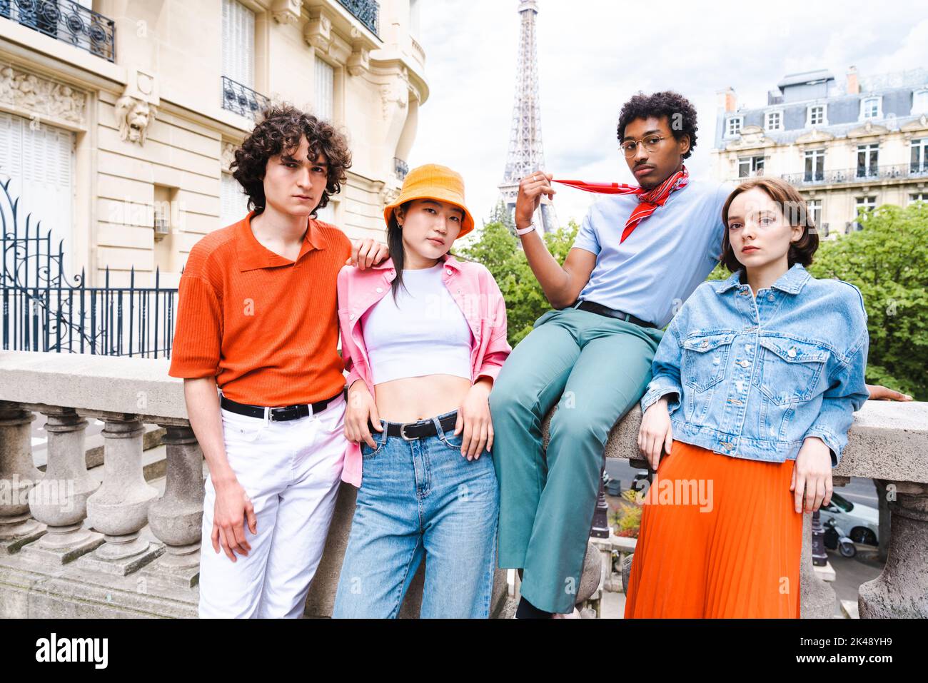 Group of young happy friends visiting Paris and Eiffel Tower, Trocadero ...