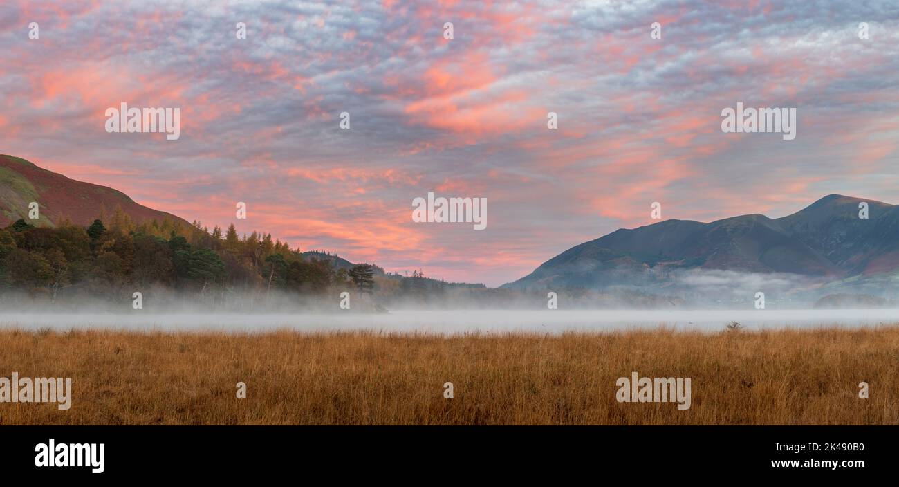 Epic Autumn sunrise landscape image looking from Manesty Park in Lake ...