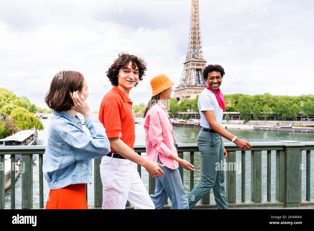 Group of young happy friends visiting Paris and Eiffel Tower, Trocadero ...
