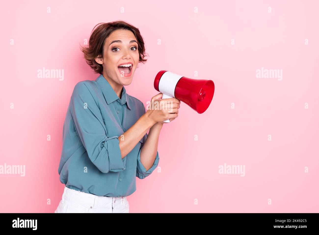 Profile photo of crazy positive girl hands hold loudspeaker say tell ...