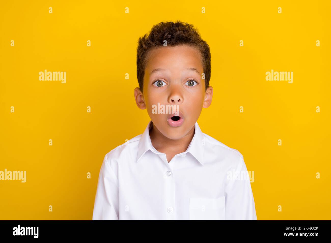 Photo of astonished speechless staring boy person dressed white clothes ...