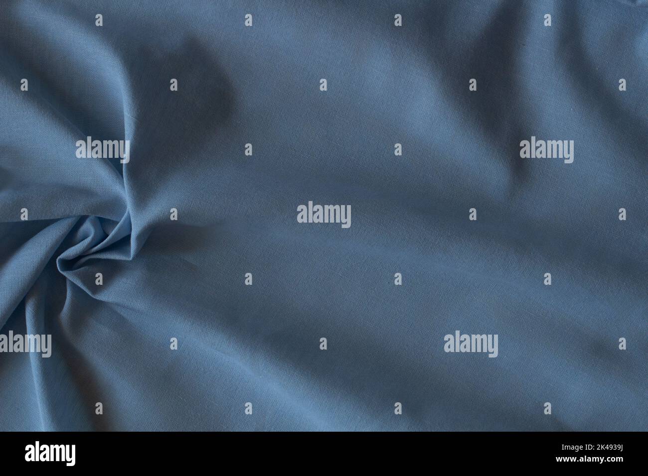 Abstract crumpled linen fabric texture background. Natural blue color ...