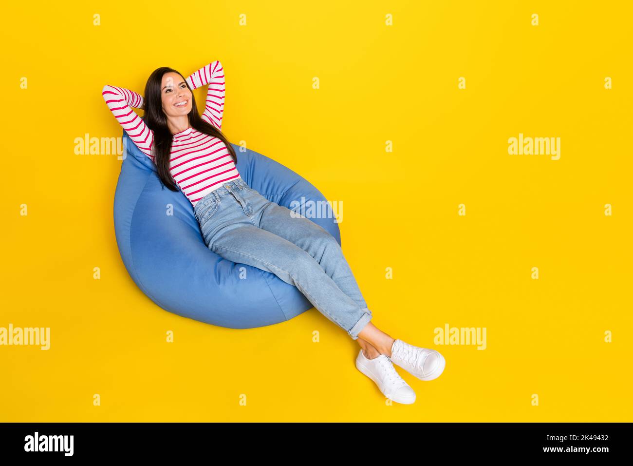 Full size photo of good mood girl wear striped long sleeve jeans lean ...