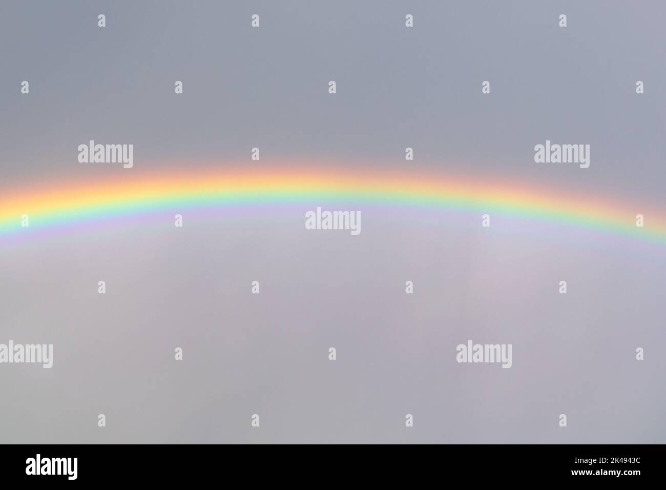 Detailed image of the top of a bright colorful rainbow Stock Photo - Alamy