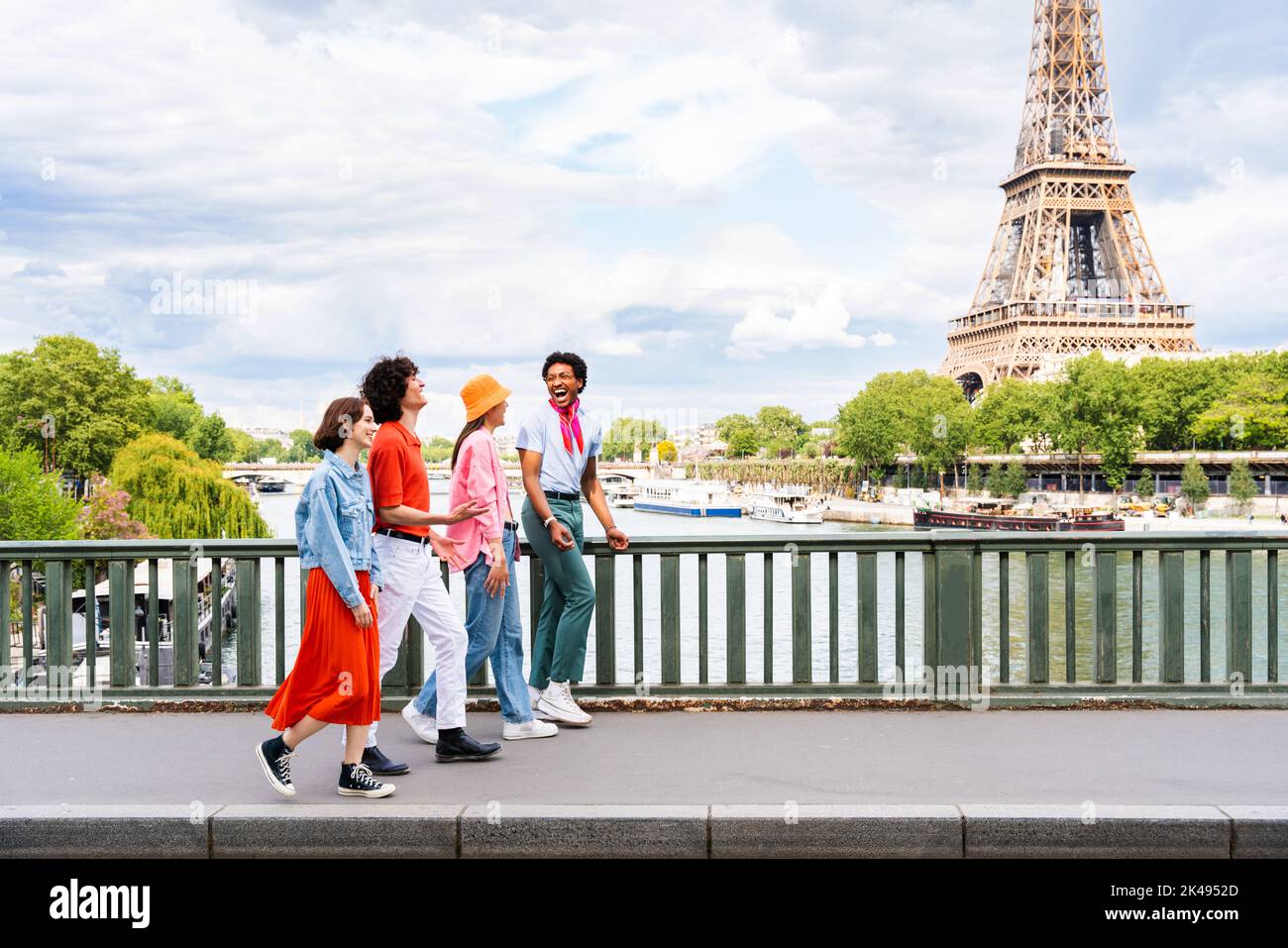 Group of young happy friends visiting Paris and Eiffel Tower, Trocadero ...