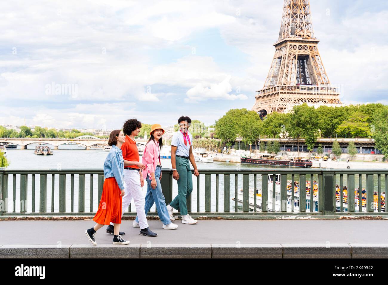 Group of young happy friends visiting Paris and Eiffel Tower, Trocadero ...
