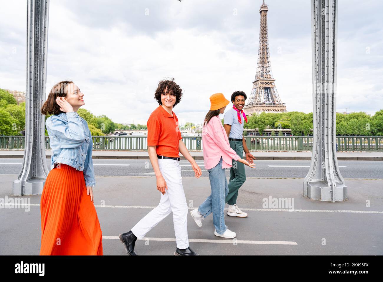 Group of young happy friends visiting Paris and Eiffel Tower, Trocadero ...