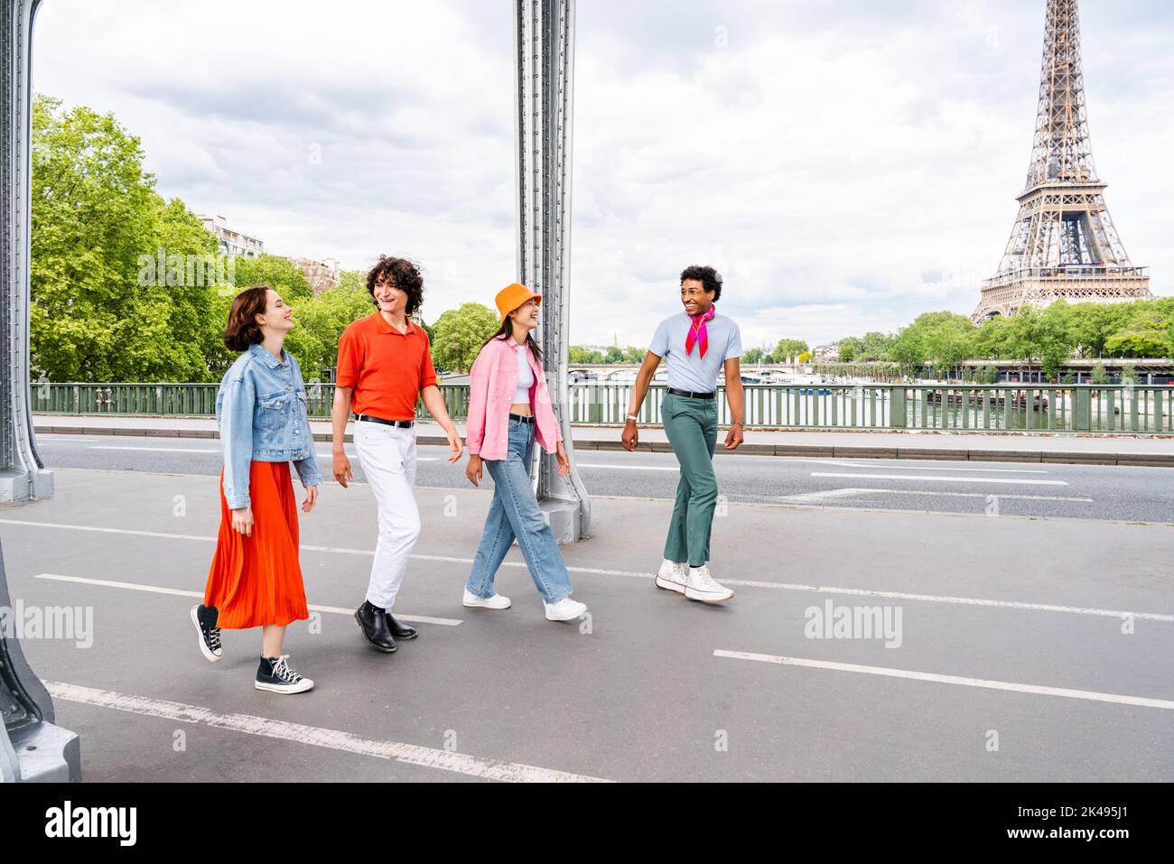 Group of young happy friends visiting Paris and Eiffel Tower, Trocadero ...