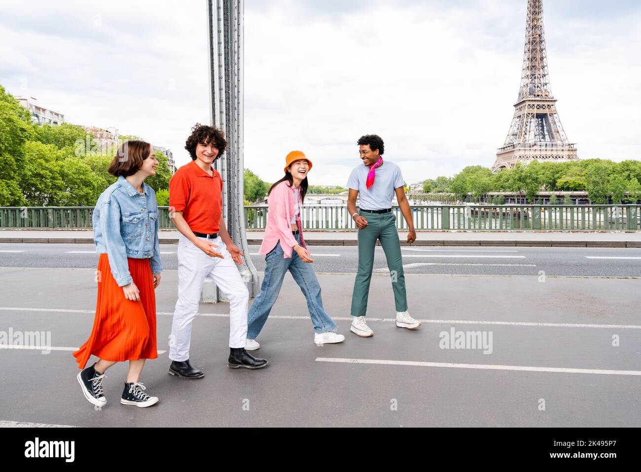 Group of young happy friends visiting Paris and Eiffel Tower, Trocadero ...