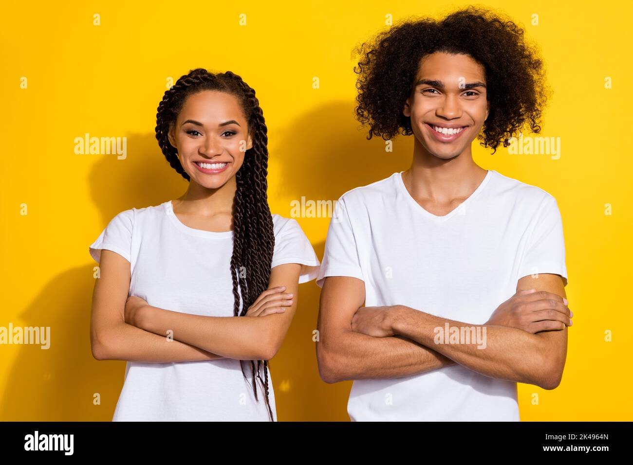 Portrait of successful cheerful lady guy crossed arms toothy smile ...