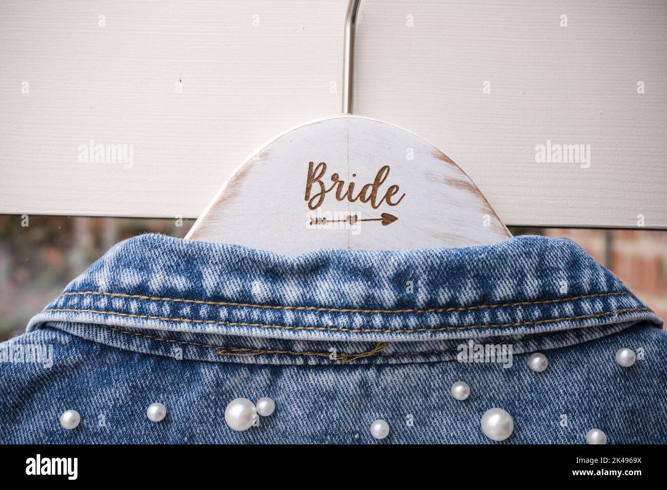 Bride wedding dress hanger with arrow pointing to bridal suite Stock ...