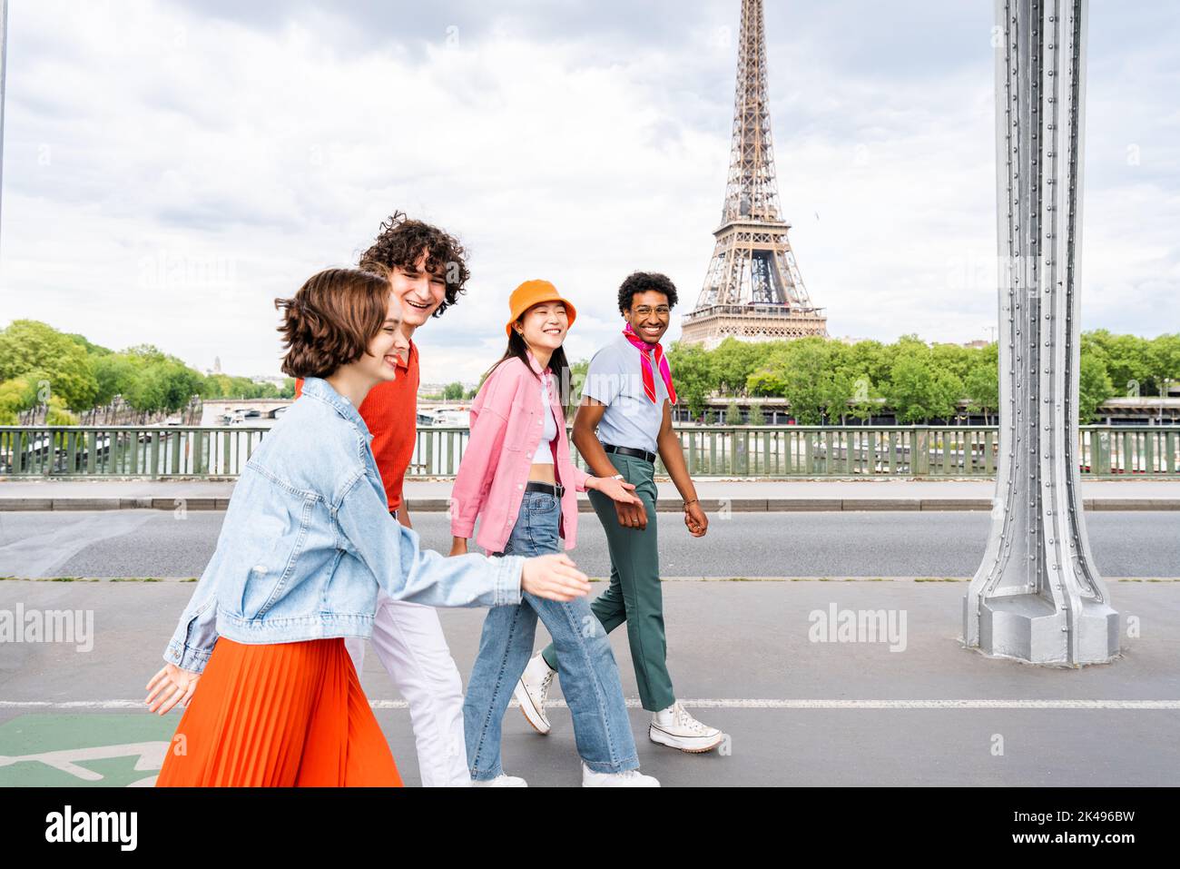 Group of young happy friends visiting Paris and Eiffel Tower, Trocadero ...