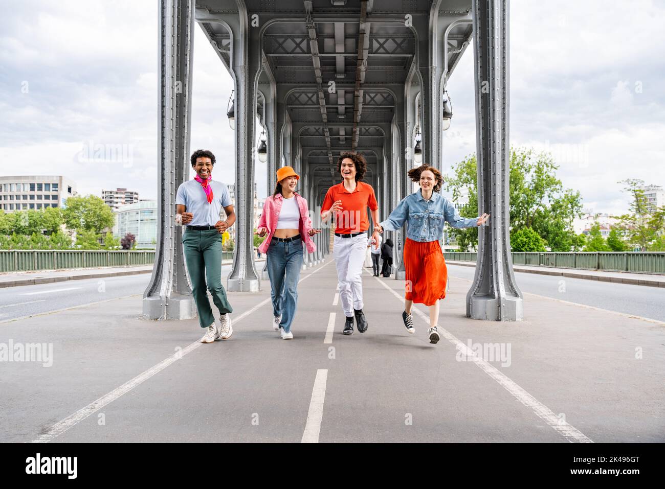 Group of young happy friends visiting Paris and Eiffel Tower, Trocadero ...