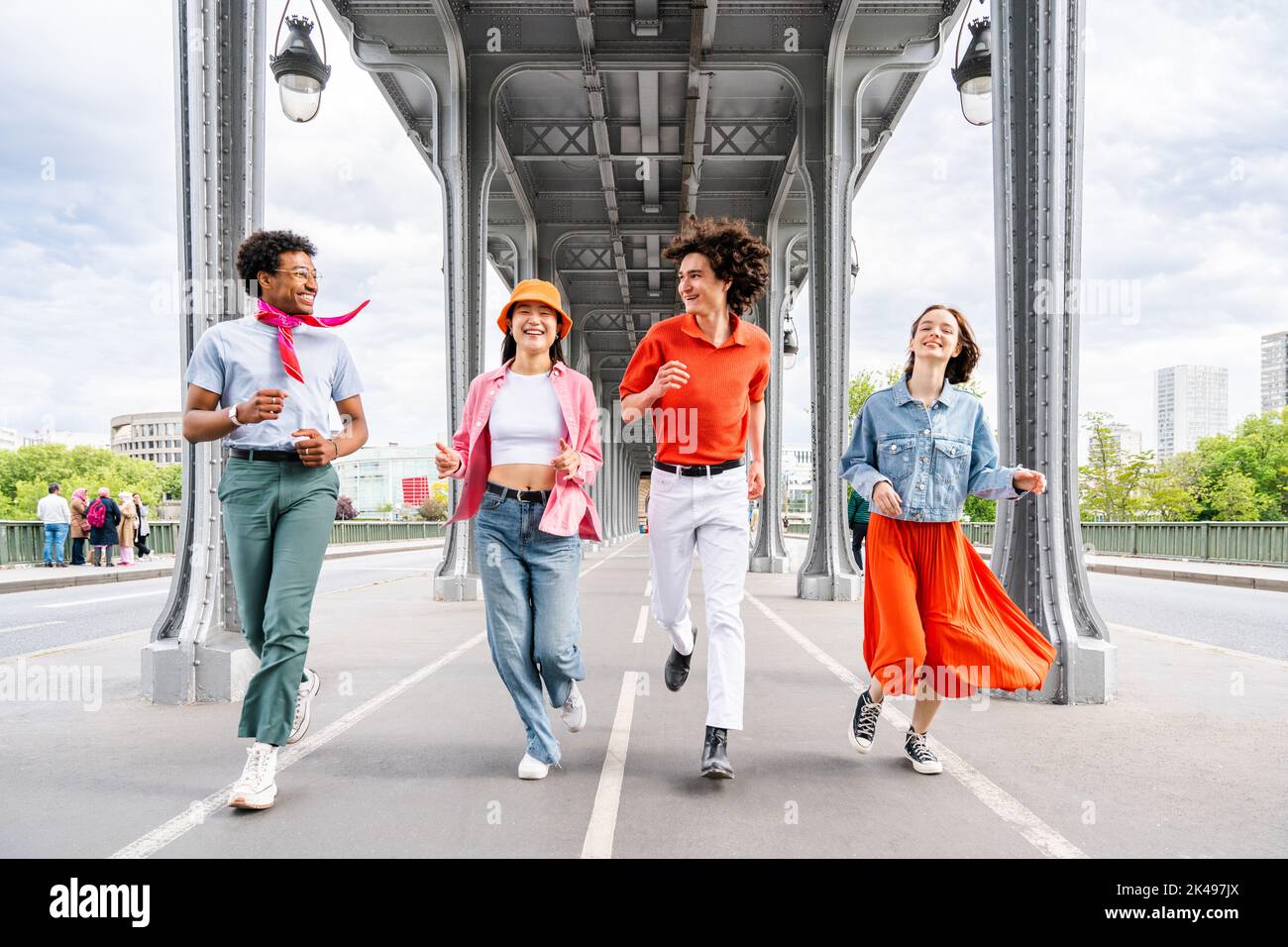 Group of young happy friends visiting Paris and Eiffel Tower, Trocadero ...