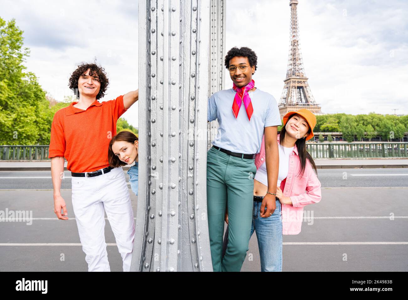 Group of young happy friends visiting Paris and Eiffel Tower, Trocadero ...
