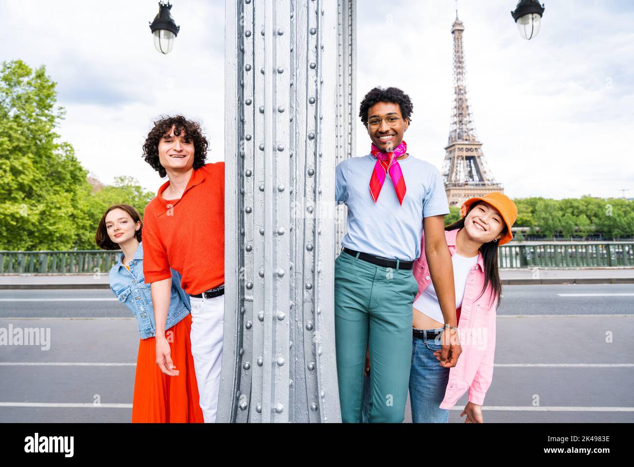 Group of young happy friends visiting Paris and Eiffel Tower, Trocadero ...