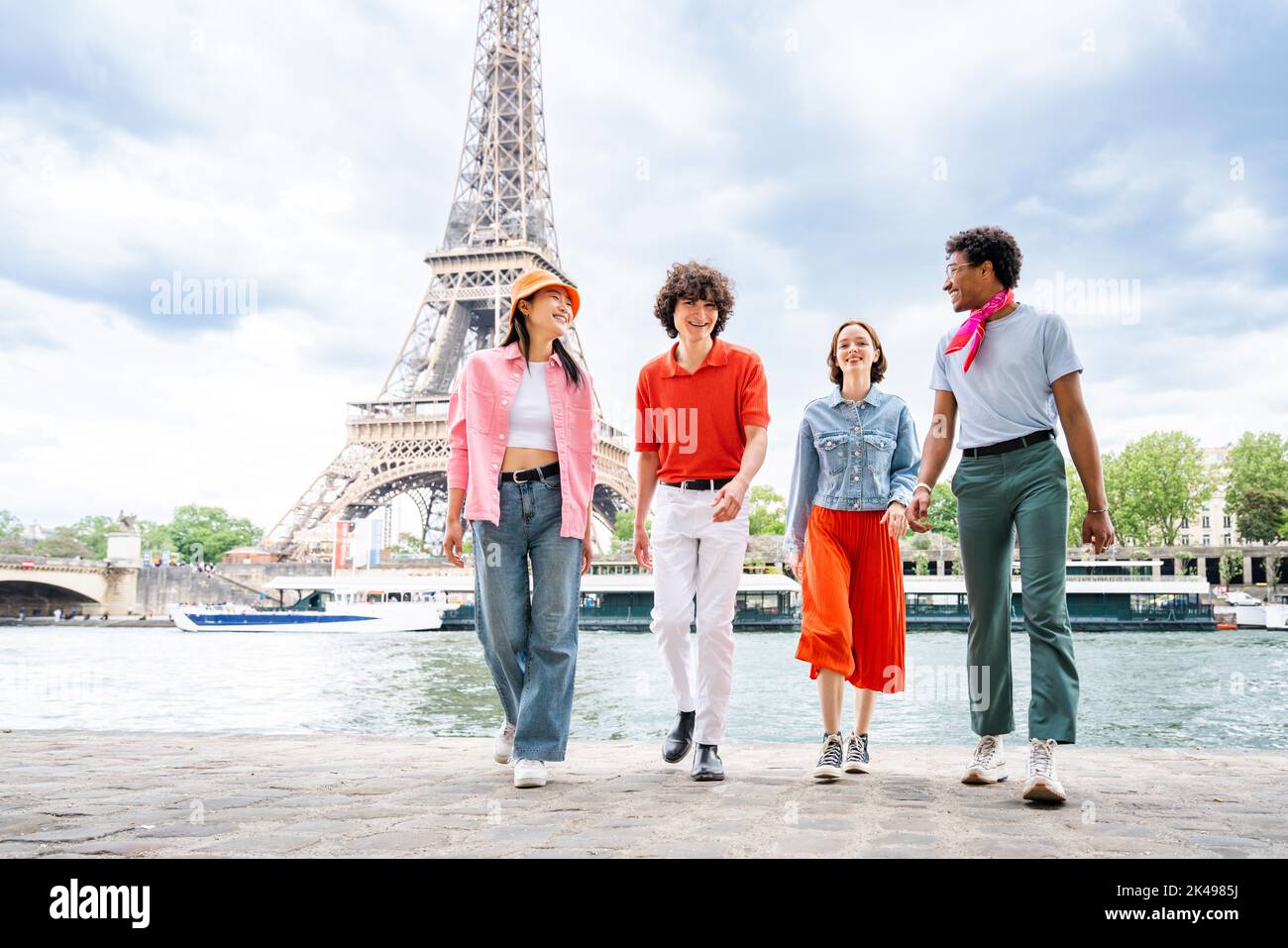 Group of young happy friends visiting Paris and Eiffel Tower, Trocadero ...