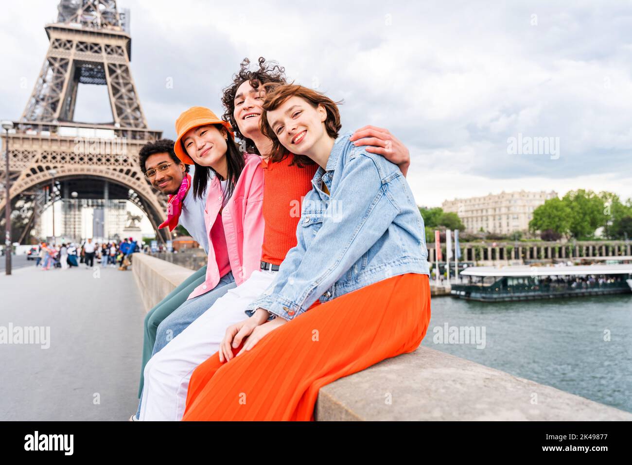 Group of young happy friends visiting Paris and Eiffel Tower, Trocadero ...