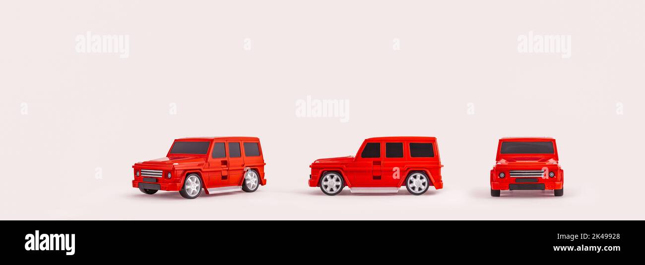 Small red car toy isolated on white background with perspective view ...