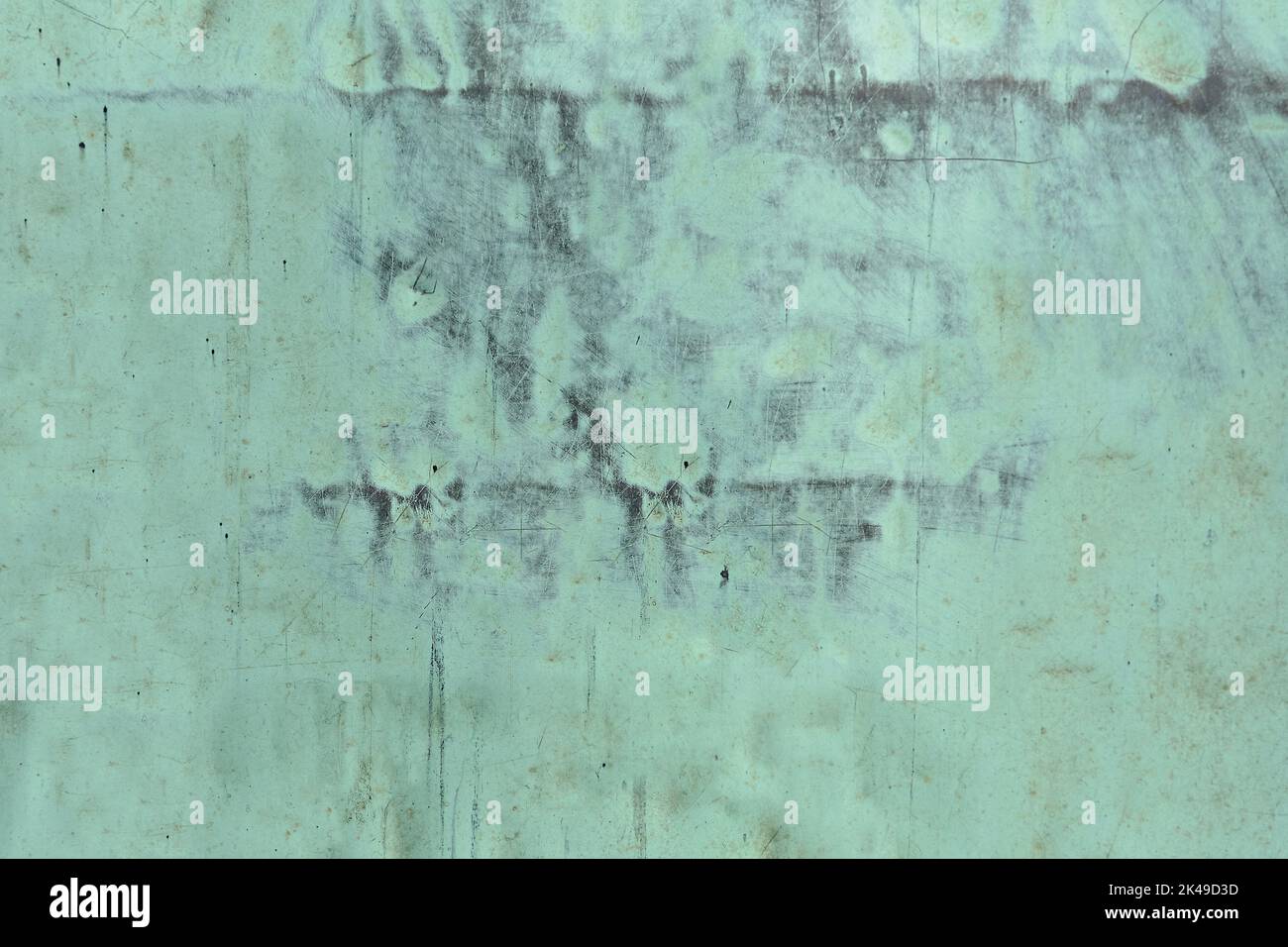 Bronze patina background with turquoise oxidation, textured cracks and ...