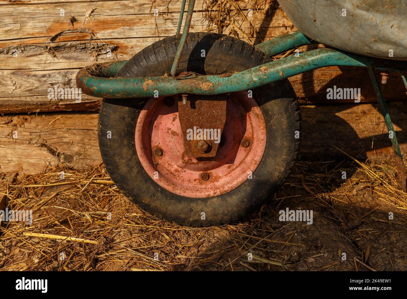 Wooden wheel barrow hi-res stock photography and images - Alamy