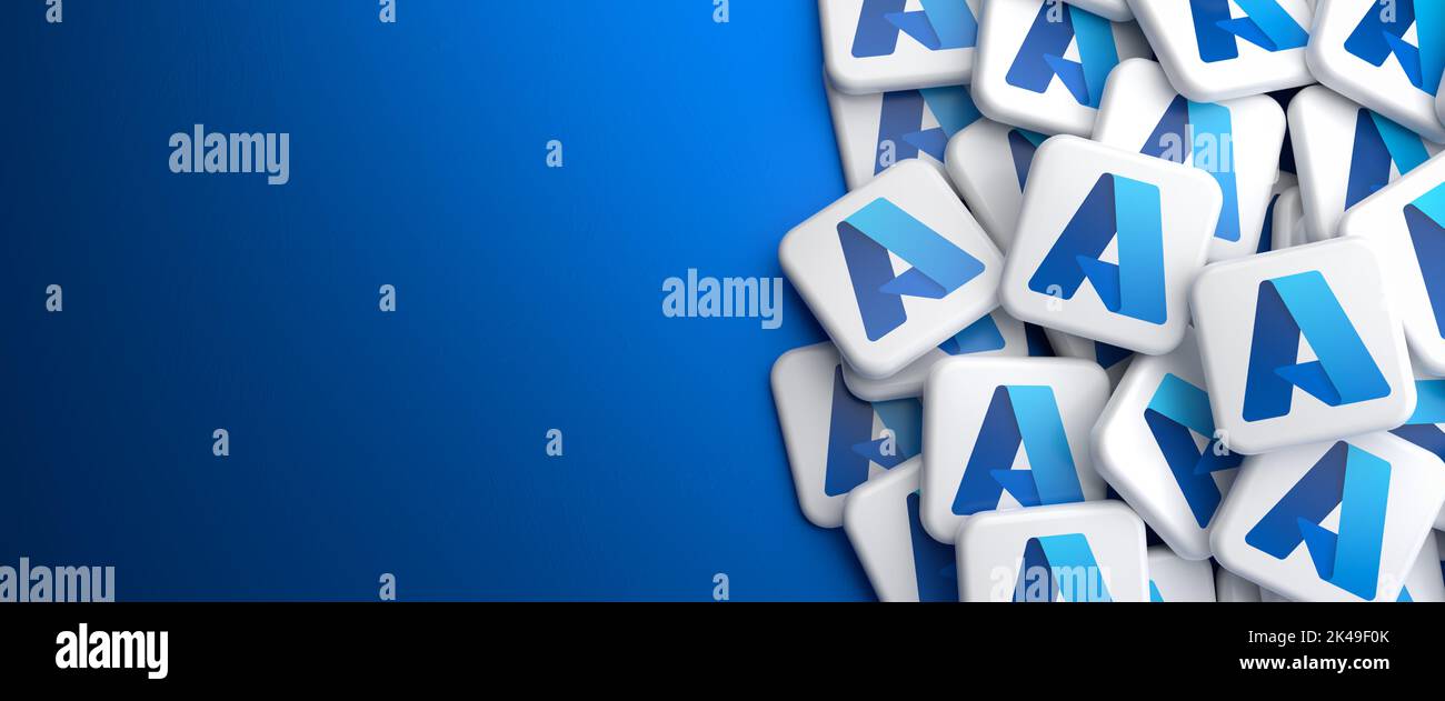 Logos of the Microsoft cloud services Azure on a heap on a table. Web ...