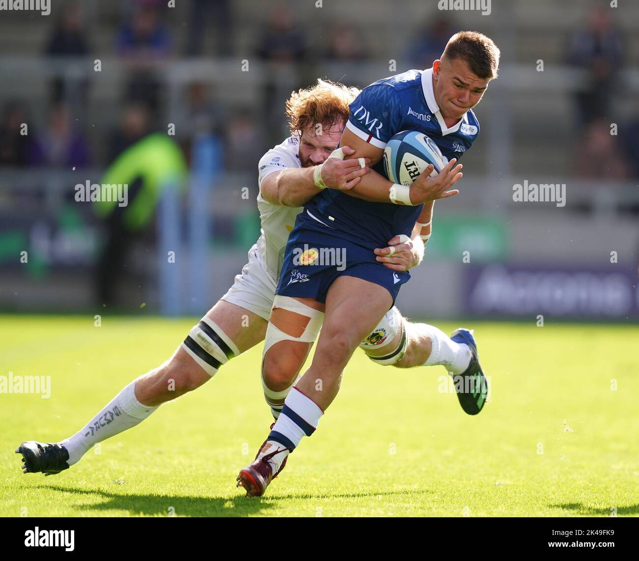 Sale Sharks Joe Carpenter is tackled by Exeter Chiefs Jannes Kirsten ...