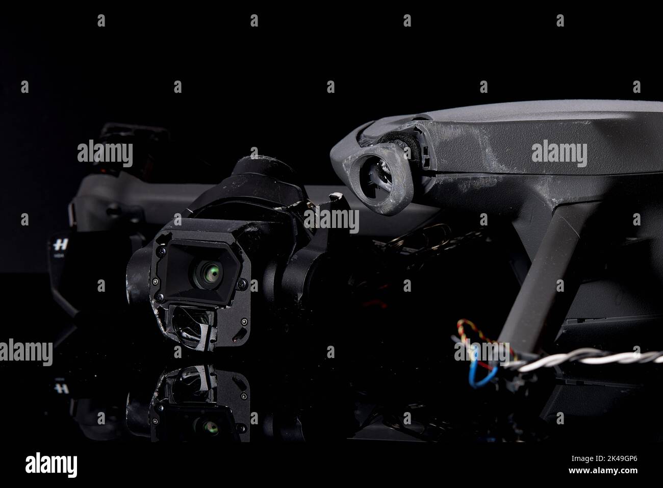 Drone DJI Mavic 3 after crashed on a black background. Drone after ...