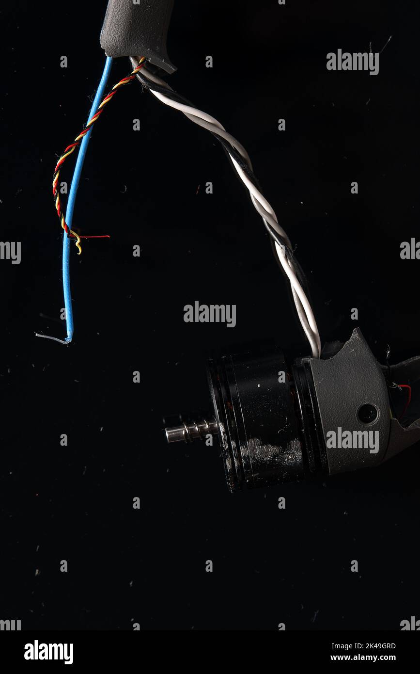 Drone DJI Mavic 3 after crashed on a black background. Drone after ...