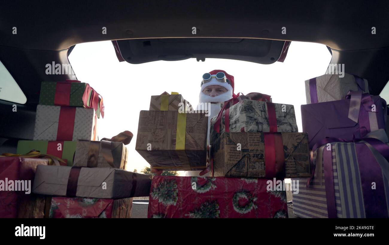 santa claus delivering gifts. gifts from santa. delivery service ...