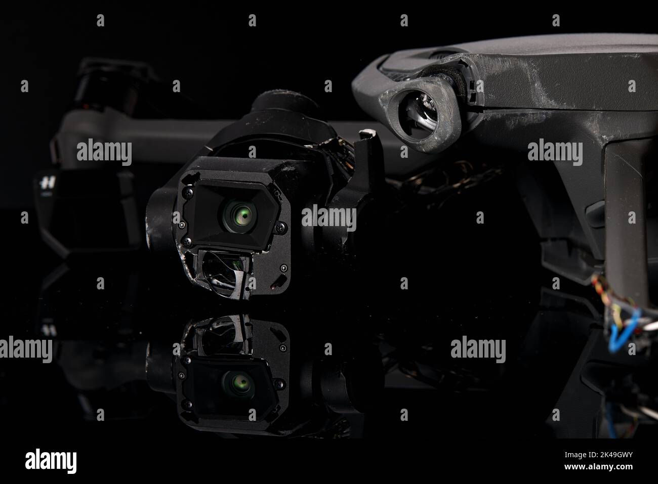 Drone DJI Mavic 3 after crashed on a black background. Drone after ...