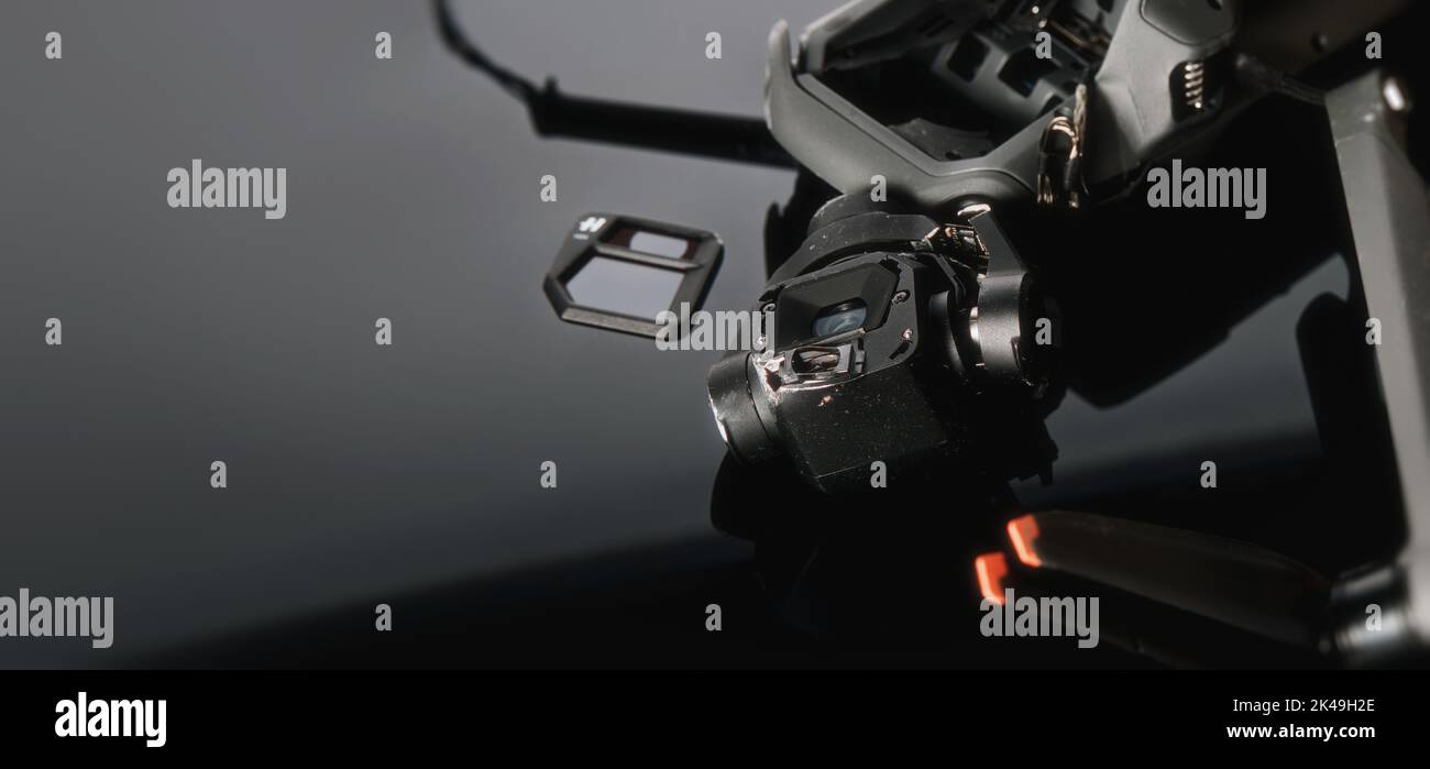 Drone DJI Mavic 3 after crashed on a black background. Drone after ...