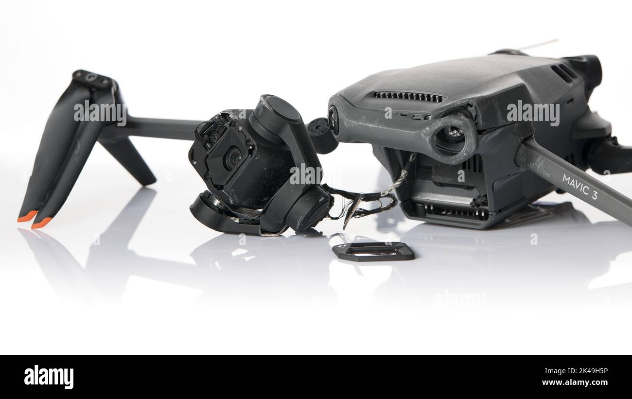 Drone DJI Mavic 3 after crashed on a white background. Drone after ...