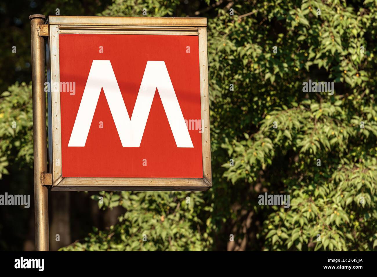 Red and white Metro sign, underground station in Milan, Lombardy, Italy ...