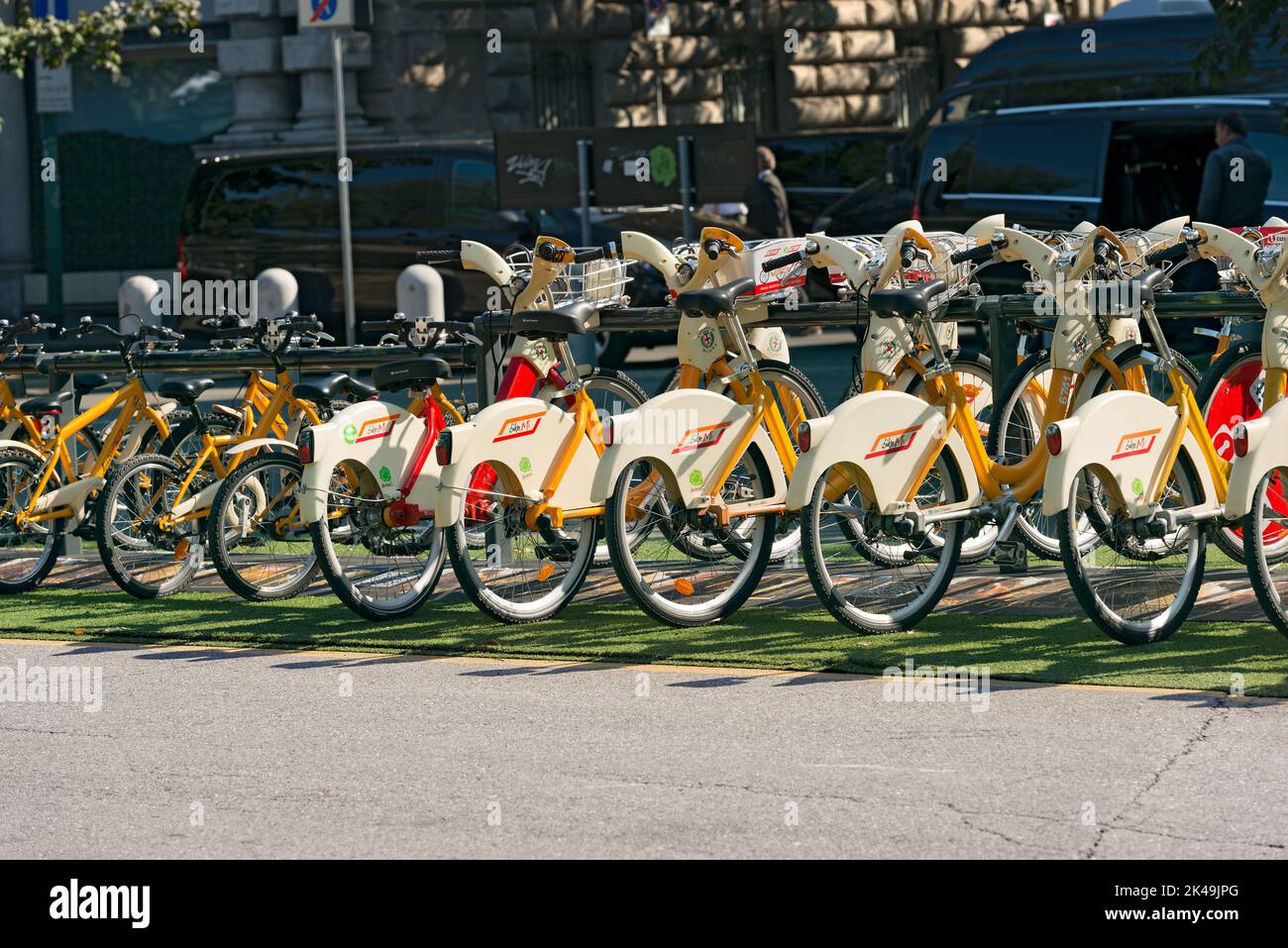 City bikes for rent parked in Milan, Lombardy, Italy. Bike sharing ...