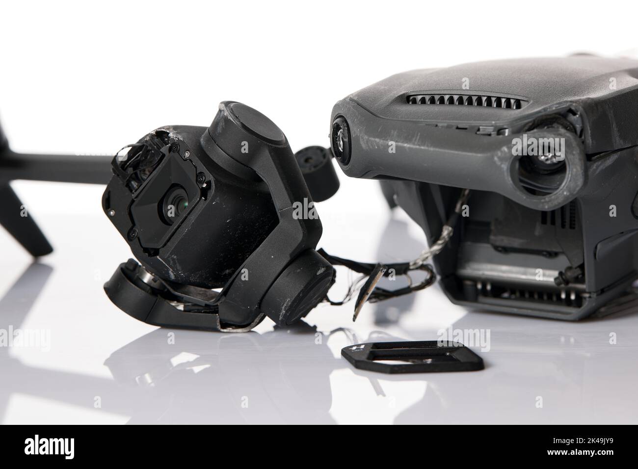 Drone DJI Mavic 3 after crashed on a white background. Drone after ...