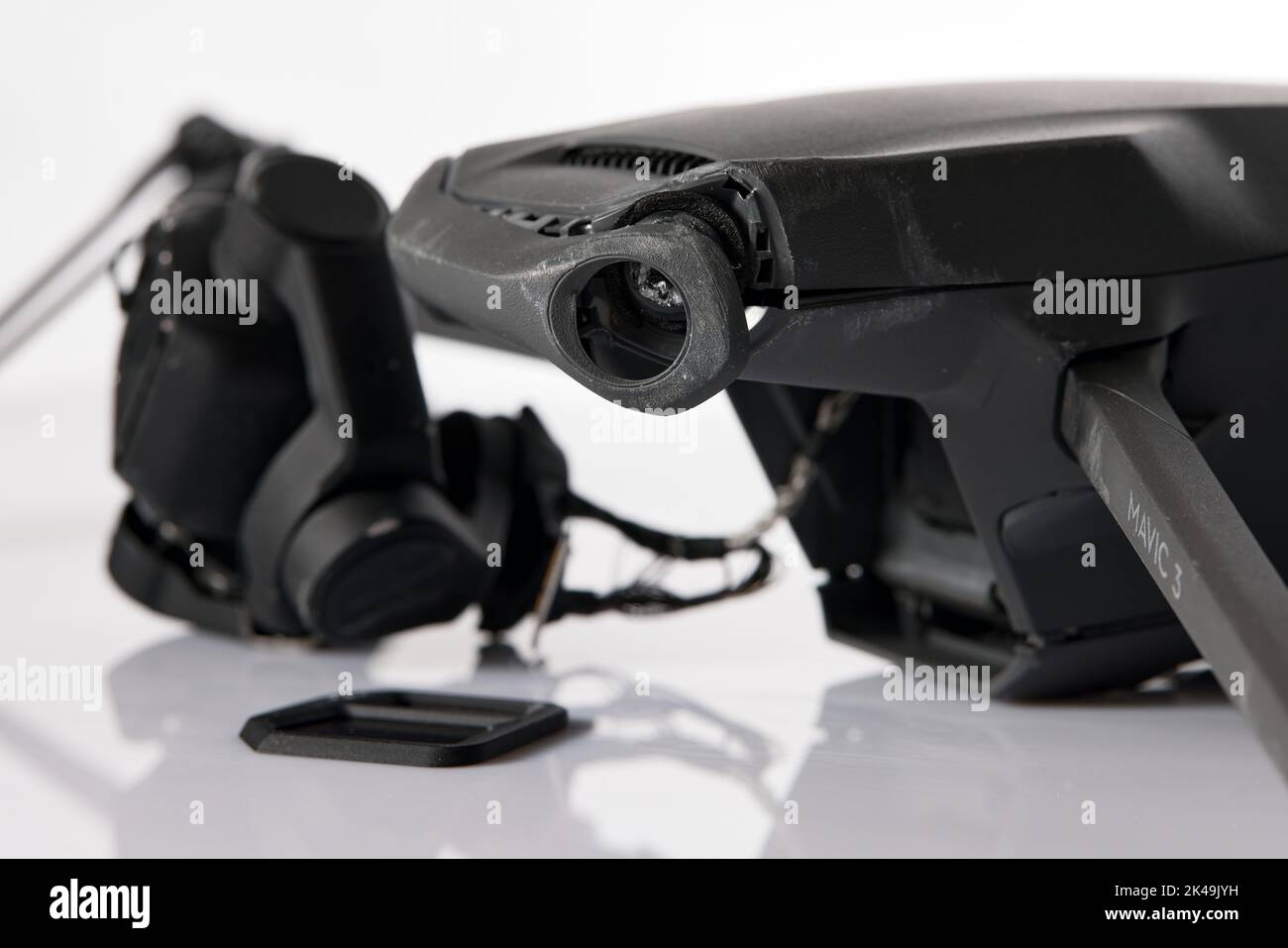 Drone DJI Mavic 3 after crashed on a white background. Drone after ...