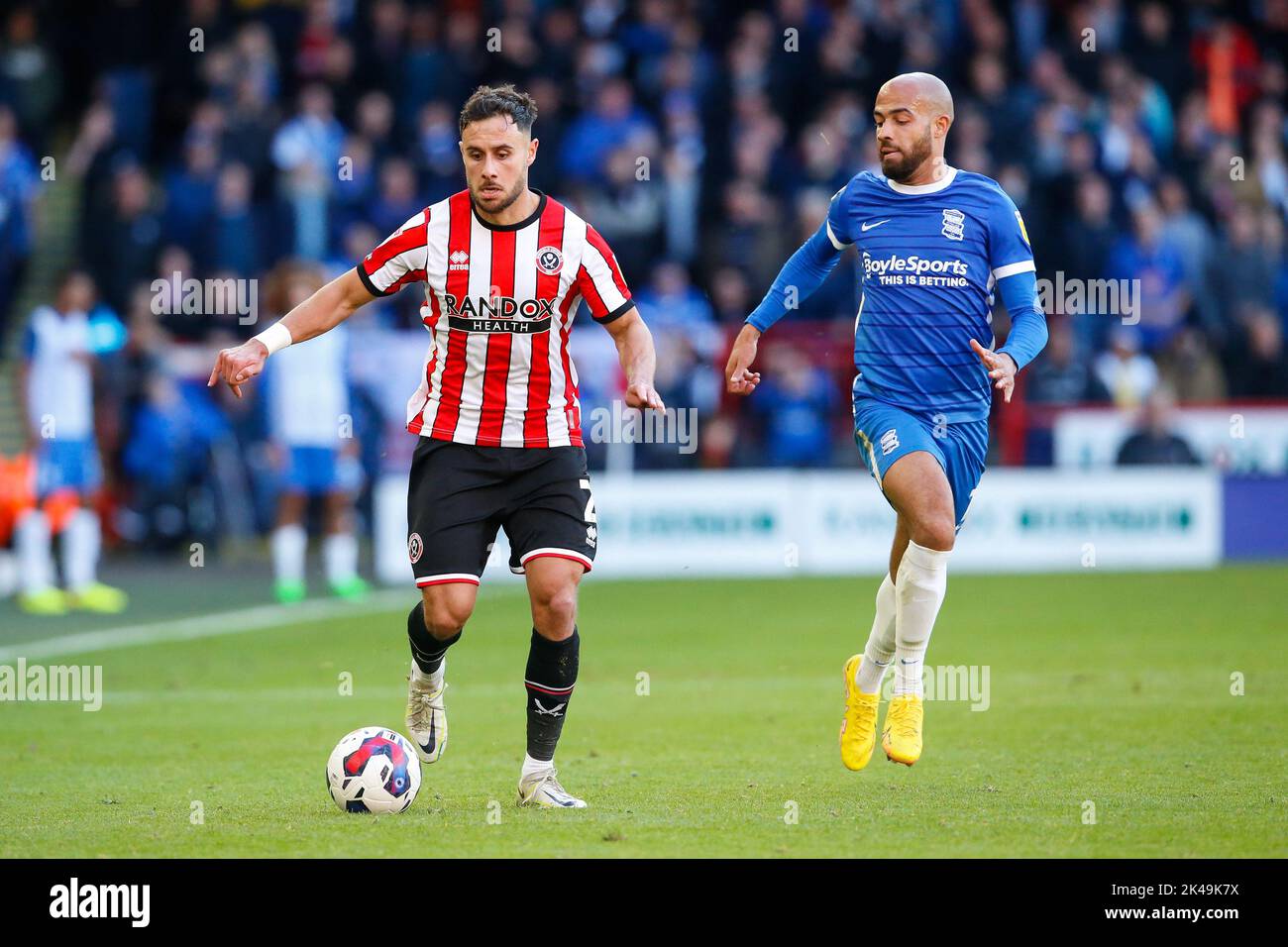 George Baldock #2 of Sheffield United and Jordan Graham #11 of ...