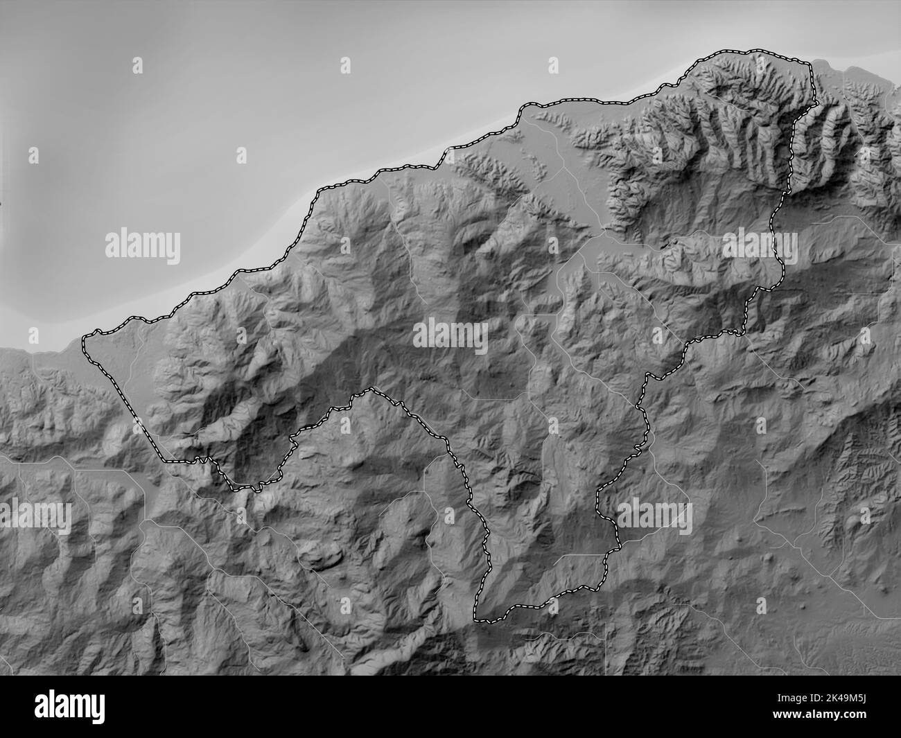 Oecusse, municipality of East Timor. Grayscale elevation map with lakes ...